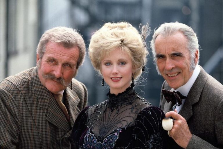 ABOVE Christopher Lee as Holmes with Patrick Macnee as Watson bot here ...