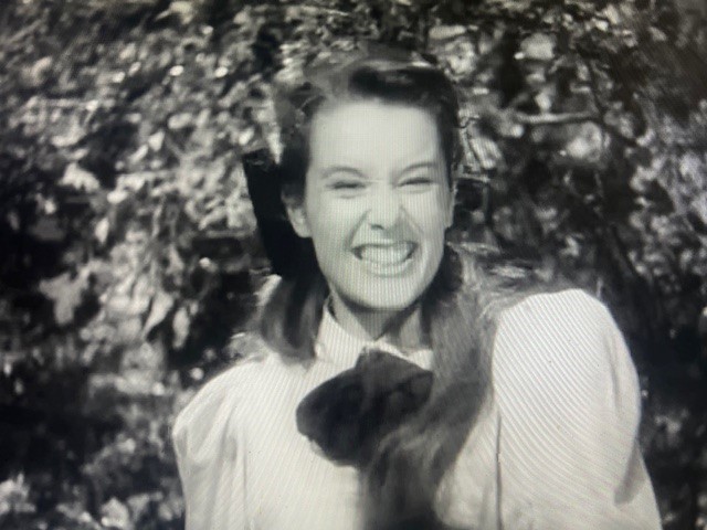 She looks so excited and his is transfixed