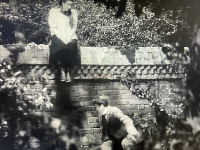 He rises to his feet to talk more